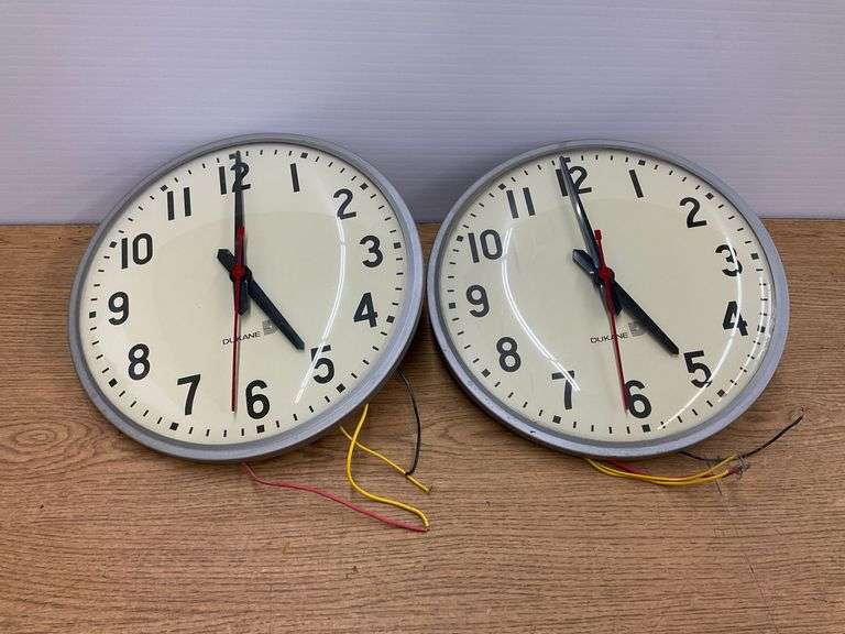 Pair of Dukane Wall Clocks...13 in. dia. - Beloit Auction & Realty