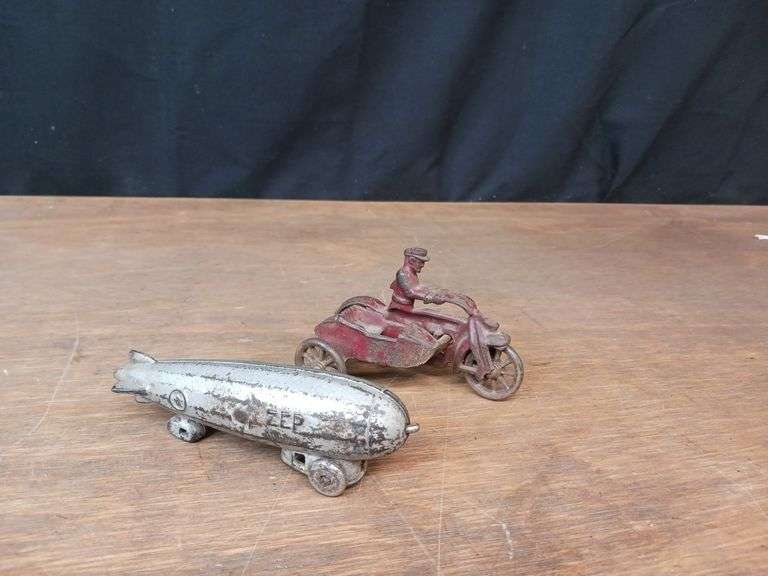 (2) Cast Iron Zeppelin + Motorcycle - Aumann Auctions, Inc.