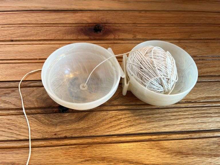 String Holder - Aumann Auctions, Inc.