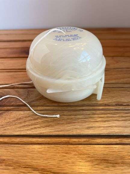 String Holder - Aumann Auctions, Inc.