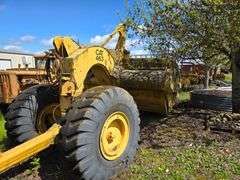 Caterpillar 463 pull scraper - Aumann Auctions, Inc.