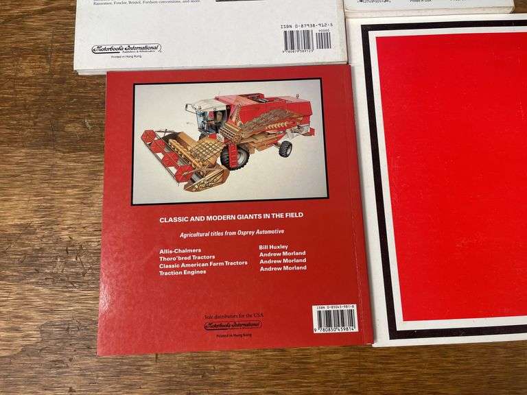 (4) Tractor, Crawler, Combine Books - Aumann Auctions, Inc.