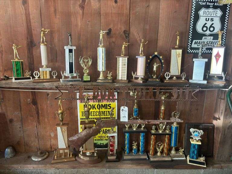 Trophies and Metal Sign - Aumann Auctions, Inc.