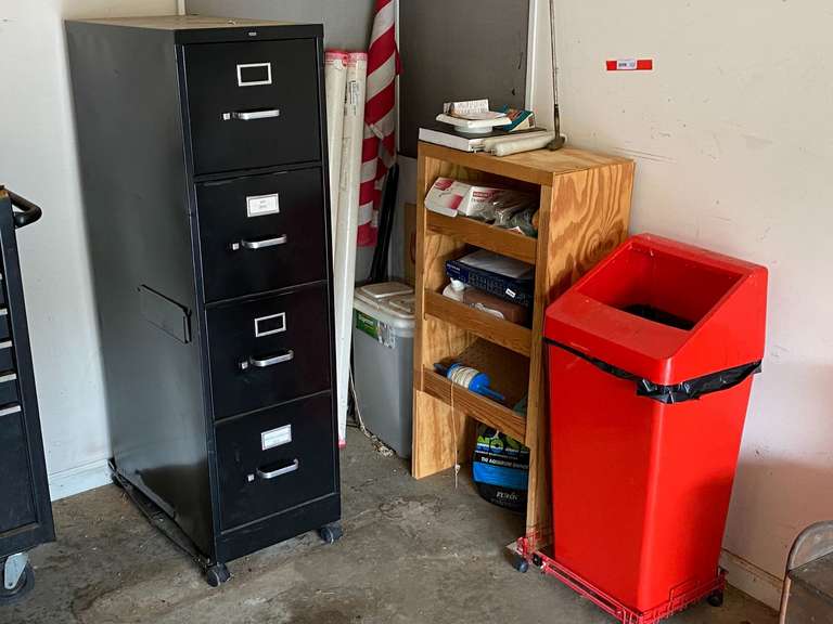 Corner Mystery lot with filing cabinet, red rolling trashcan, wood ...