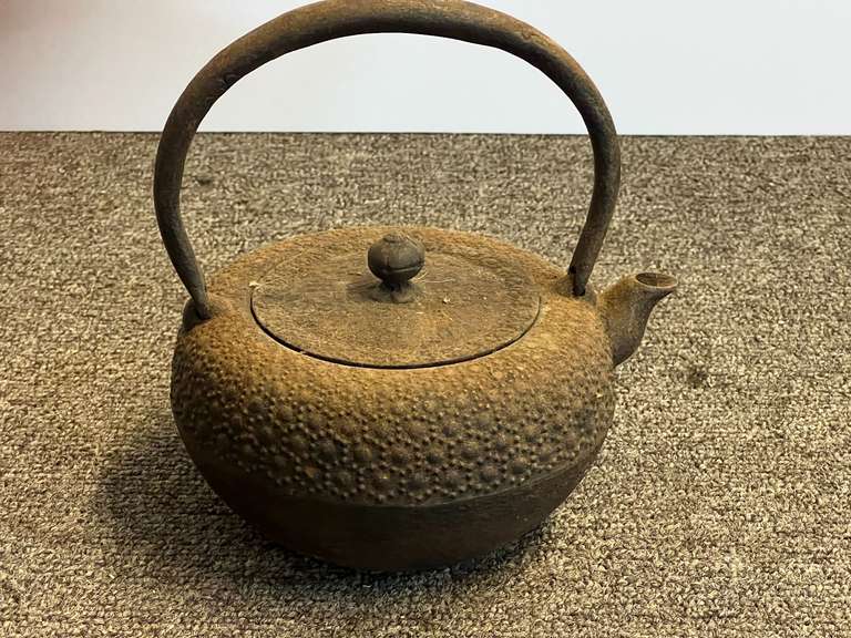 Small cast-iron tea pot, believed to be a Nambu Tekki, a traditional Japanese teapot, see ...
