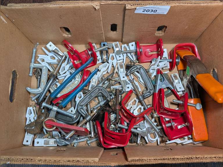 BOX FILLED WITH C-CLAMPS, SPRING-LOADED CLIPS, CHANNEL LOCKS, AND MORE ...