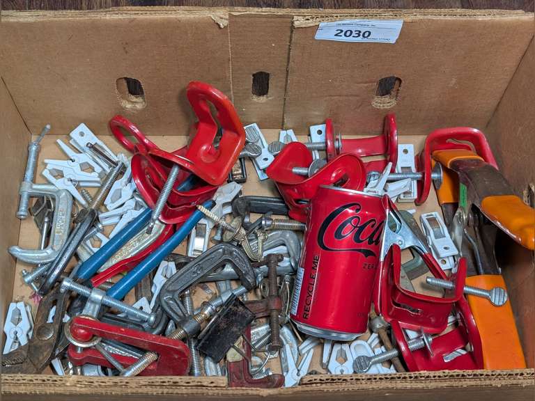 BOX FILLED WITH C-CLAMPS, SPRING-LOADED CLIPS, CHANNEL LOCKS, AND MORE ...