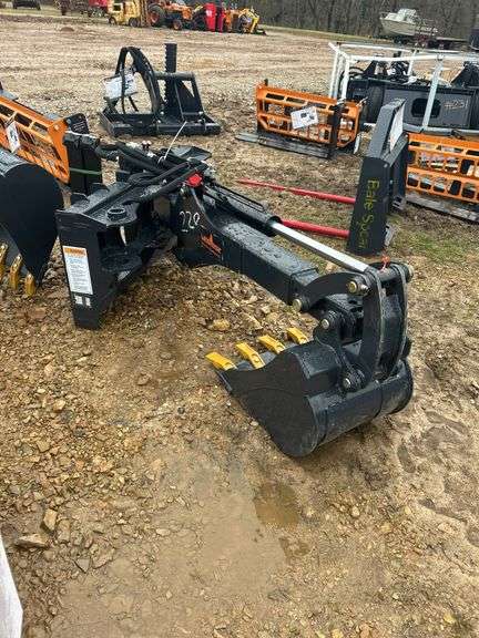 L7 - BIG ARM BACKHOE FOR SKIDSTEER - Ford Brothers, Inc.
