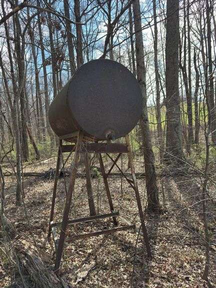Large Metal Storage Tank on Stand - Ford Brothers, Inc.