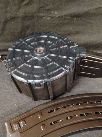 Collection of Firearm Magazines with DeWalt Bag - Ford Brothers, Inc.