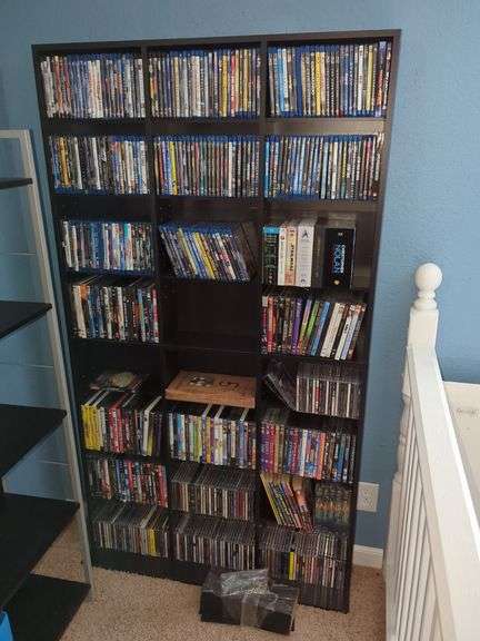 Large Assortment of Blu-ray, DVDs, and CDs in Display Shelving Unit ...