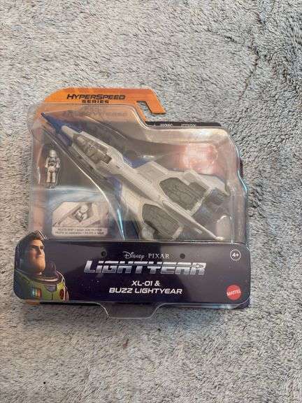 DISNEY PIXAR LIGHTYEAR XL-01 & BUZZ LIGHTYEAR - Ford Brothers, Inc.
