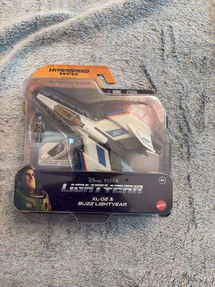 DISNEY PIXAR LIGHTYEAR XL-02 & BUZZ LIGHTYEAR - Ford Brothers, Inc.