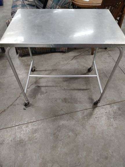 STAINLESS STEEL TABLE ON ROLLERS - 36X24X34 - Ford Brothers, Inc.