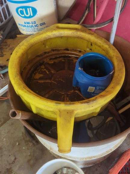 Mixed Lot: Barrel, Buckets, Oil Catch and More - Ford Brothers, Inc.