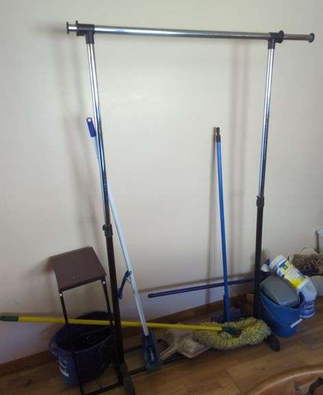Cleaning Supplies and Garment Rack - Ford Brothers, Inc.