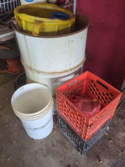 Mixed Lot: Barrel, Buckets, Oil Catch and More - Ford Brothers, Inc.