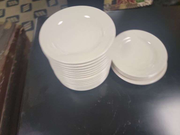Stack of White Dinner Plates - Ford Brothers, Inc.