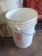 Mixed Lot: Barrel, Buckets, Oil Catch and More - Ford Brothers, Inc.