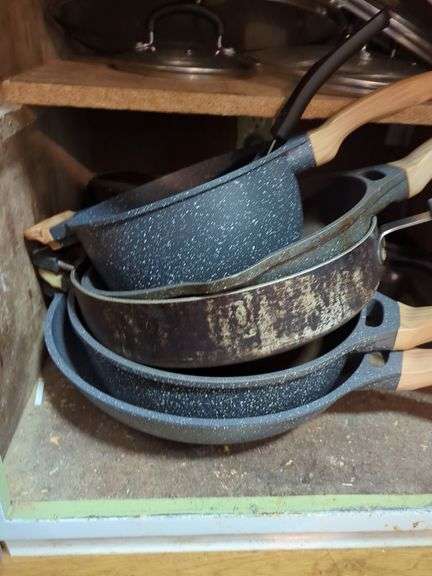 Assorted Kitchen Cookware: Pots, Pans, and Lids - Ford Brothers, Inc.