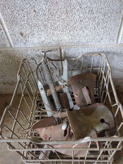 Assorted Metal Traps and Tools in Wire Basket - Ford Brothers, Inc.