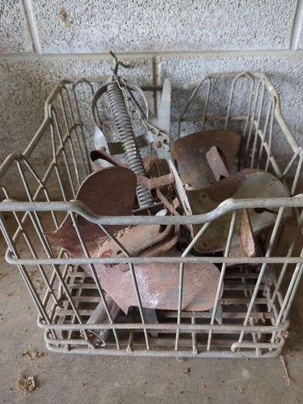 Assorted Metal Traps and Tools in Wire Basket - Ford Brothers, Inc.