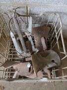 Assorted Metal Traps and Tools in Wire Basket - Ford Brothers, Inc.