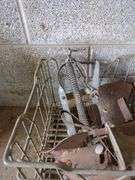 Assorted Metal Traps and Tools in Wire Basket - Ford Brothers, Inc.