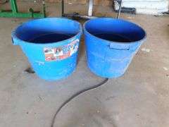Two Heated 16 Gallon Water Buckets - Ford Brothers, Inc.