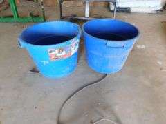 Two Heated 16 Gallon Water Buckets - Ford Brothers, Inc.