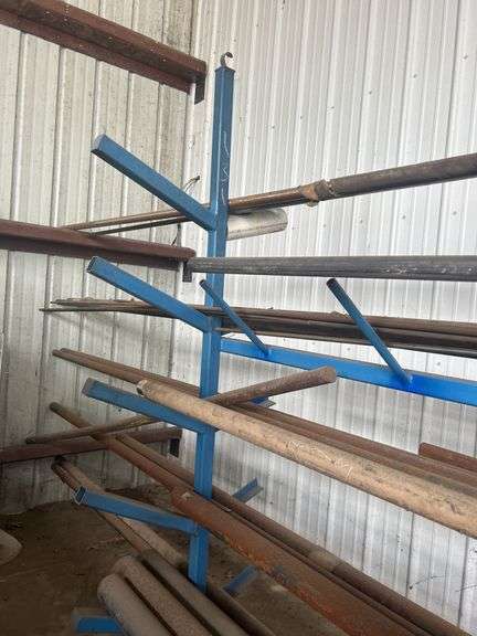 Steel Rack with Assorted Steel & Metal Stock and Lathe Chuck - Ford ...