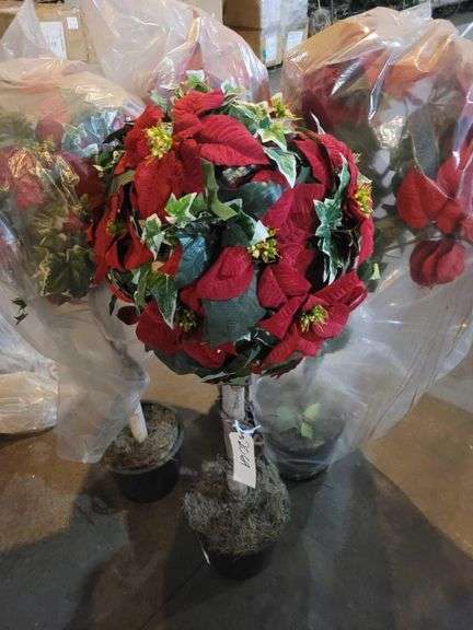4- 4ft. H. Poinsettia Topiary Trees - Hostetter Auctioneers