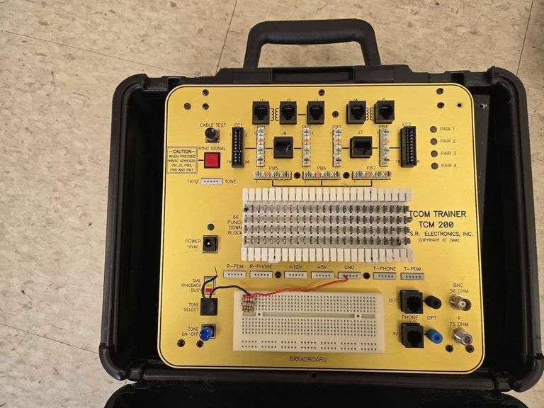 TCOM Trainer, TCM 200, in Cases x3 - Hostetter Auctioneers