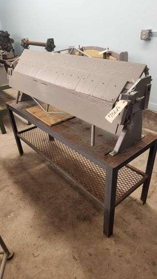 46 in Brake on Metal Table - Hostetter Auctioneers