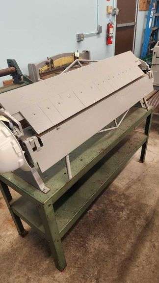 46 in Brake on Metal Table - Hostetter Auctioneers