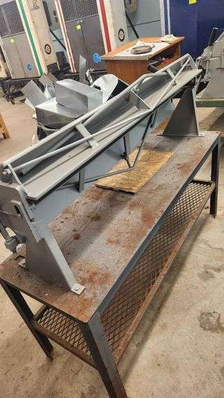 46 in Brake on Metal Table - Hostetter Auctioneers