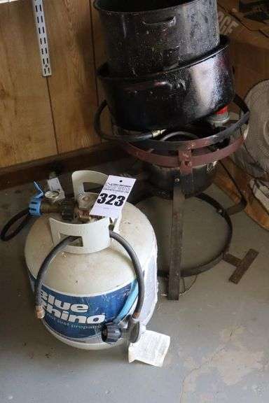 Propane Cooker with pots and Propane tanks - Comas Montgomery Realty ...