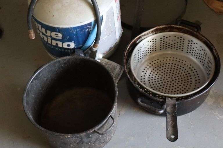 Propane Cooker with pots and Propane tanks - Comas Montgomery Realty ...