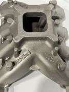 New Edlebrock SB Chevy R07 Intake Manifold - Iron Horse Auction Company