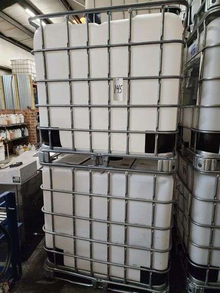 2 Schuetz 275 Gallon Stackable IBC Tote Tanks - Iron Horse Auction Company