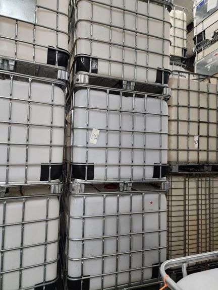 4 Schuetz 275 Gallon Stackable IBC Tote Tanks - Iron Horse Auction Company