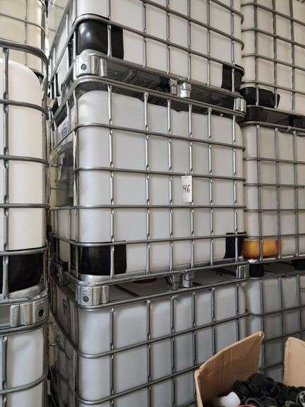 4 Schuetz 275 Gallon Stackable IBC Tote Tanks - Iron Horse Auction Company