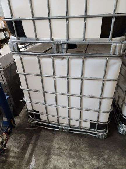 2 Schuetz 275 Gallon Stackable IBC Tote Tanks - Iron Horse Auction Company